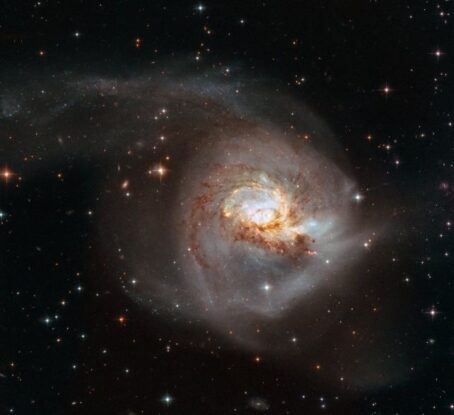 JWST Photographs a Fiery Spiral Galaxy With an Unexpectedly Violent ...
