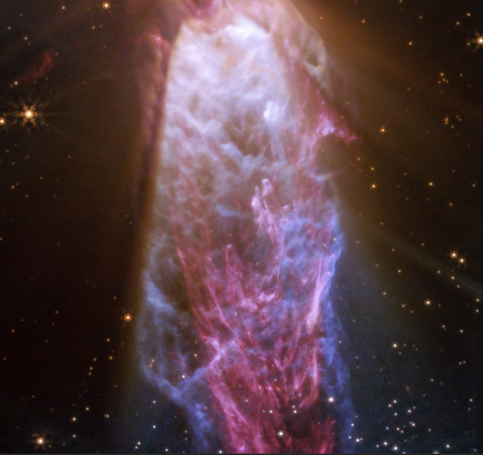 Incredible Image Reveals a Cosmic Hourglass Shimmering in Space ...