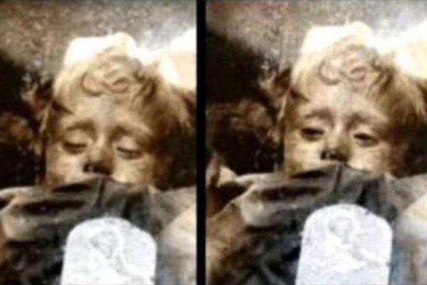 Why does this child mummy appear to open and close her eyes?